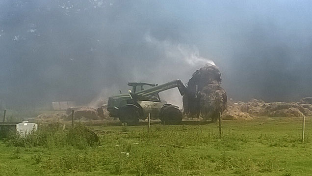 Photos: Fire destroys bales and machinery at Cheshire farm - Farmers Weekly