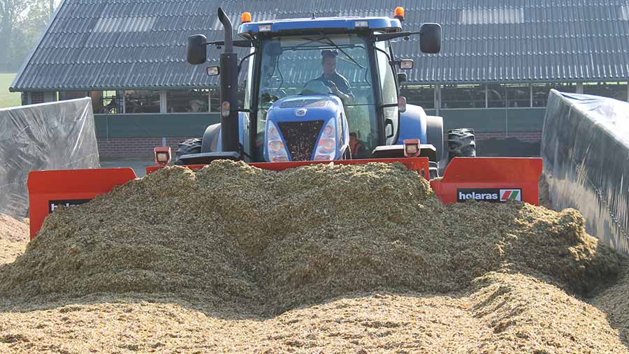 Heavy-duty Holaras silage compactor set to work on UK clamps - Farmers ...