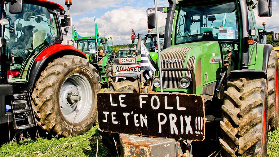 Help! French farmer mows desperate plea in wheat field - Farmers Weekly