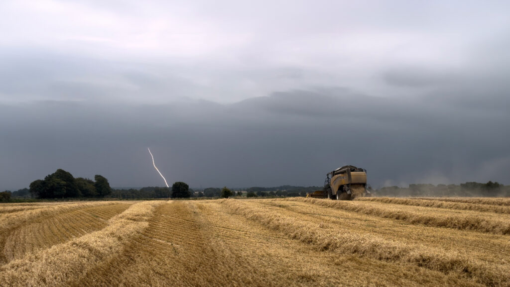 Photo of the Week: Lightning strikes over barley harvest - Farmers Weekly